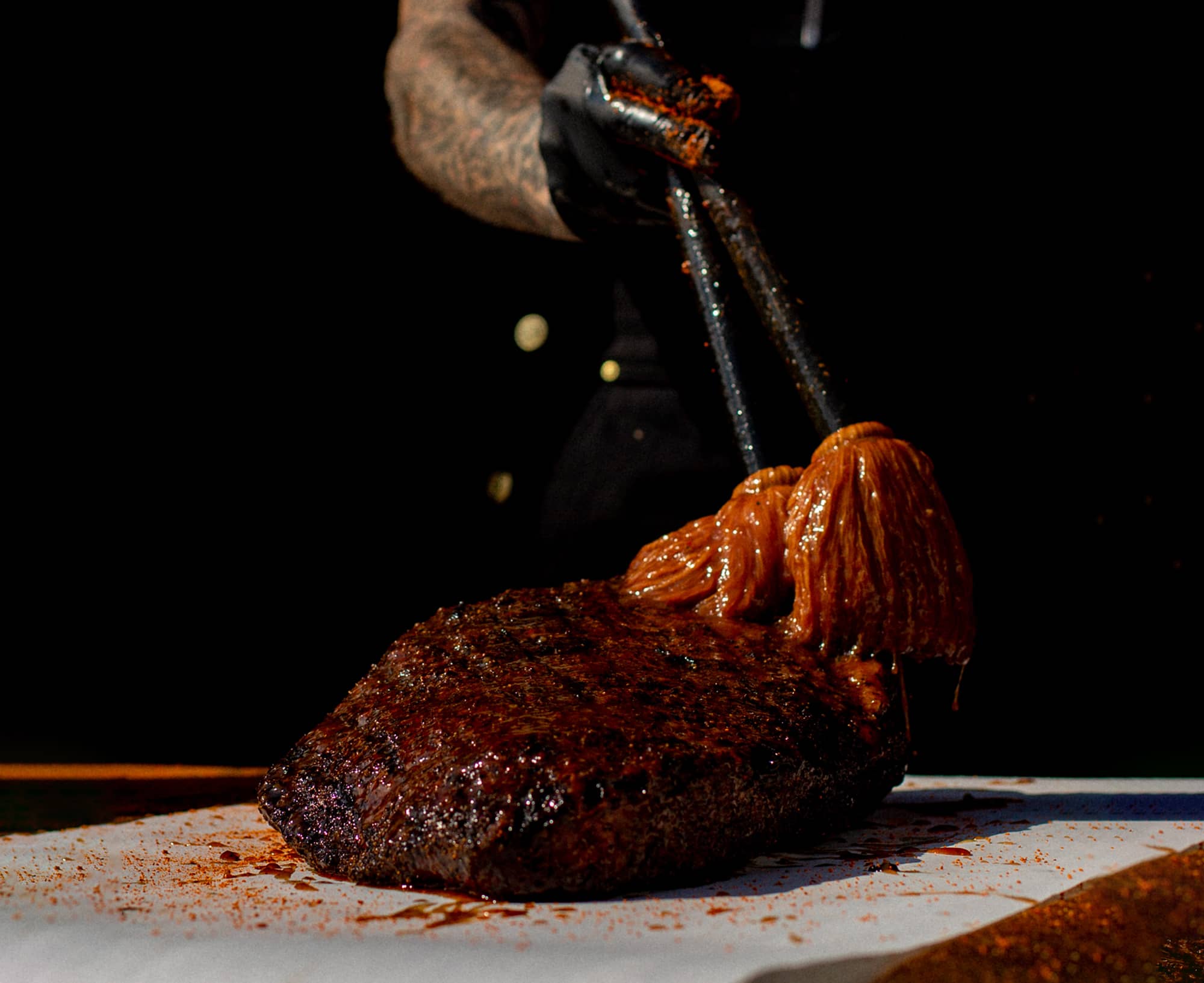 mopping-brisket | Dinosaur Bar-B-Que